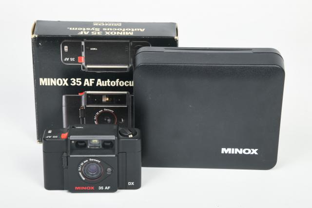 Minox 35 AF DX Obj. Minoxar 3.5/32, dans son coffret - auctions & price ...